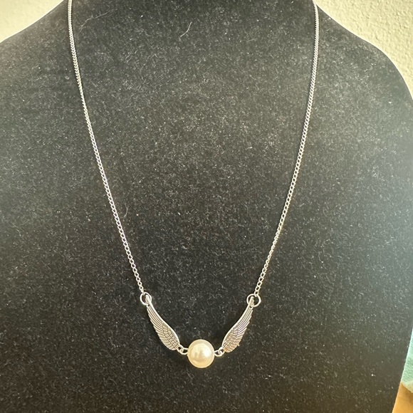 Jewelry | Harry Potter Snitch Necklace In Colors White And Silver ...